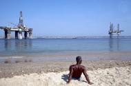 angola-oil-rigs-beach | African Arguments